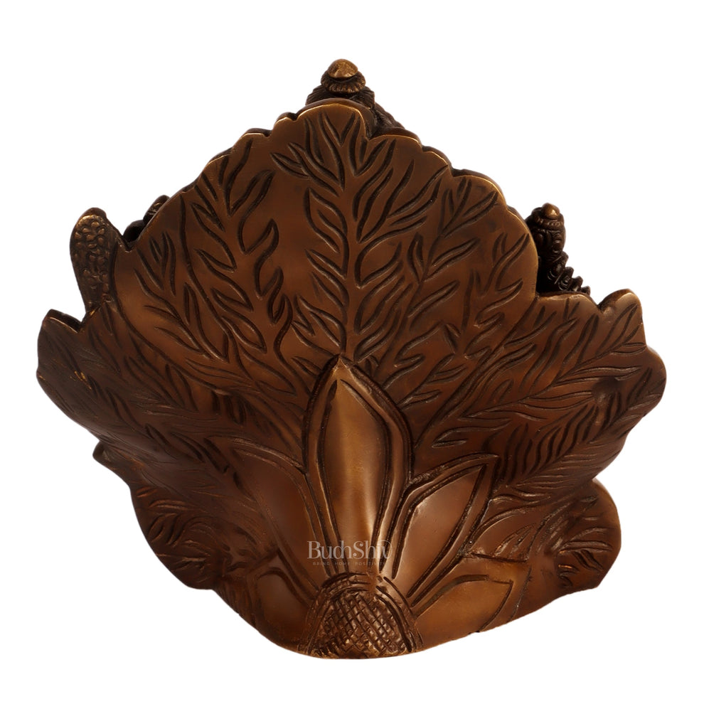 Buy Beautifully Handcrafted Brass Ganapathi Statue Seated on Leaf ...